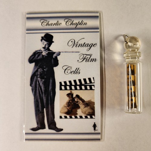 charlie chaplin vintage film cells , film strip inside a vial and ...