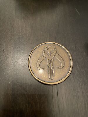 The Mandalorian MYTHOSAUR SKULL emblem coin medallion Disneyland ...