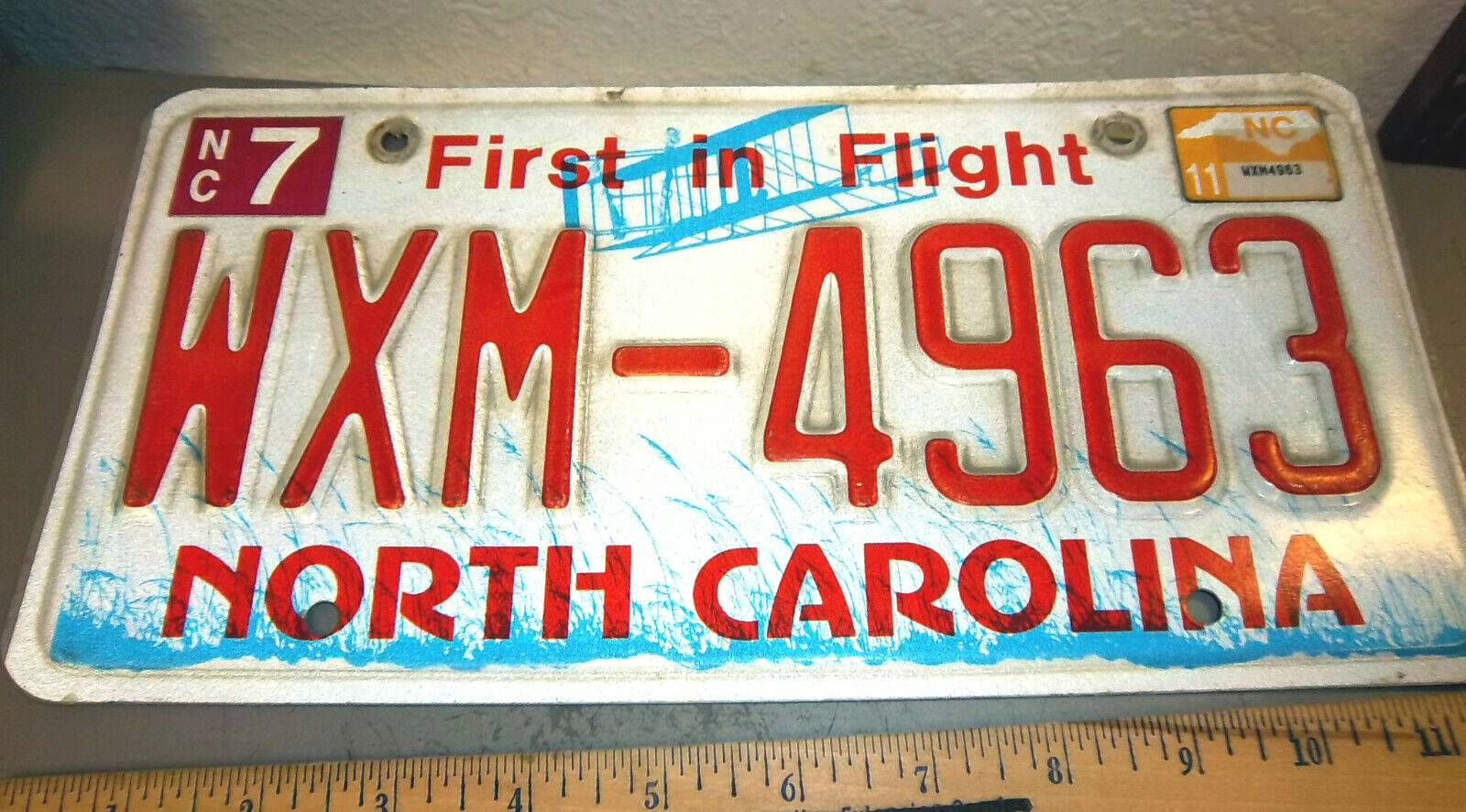 North Carolina License Plate, WXM 4963, ex 2011, first in flight, w ...