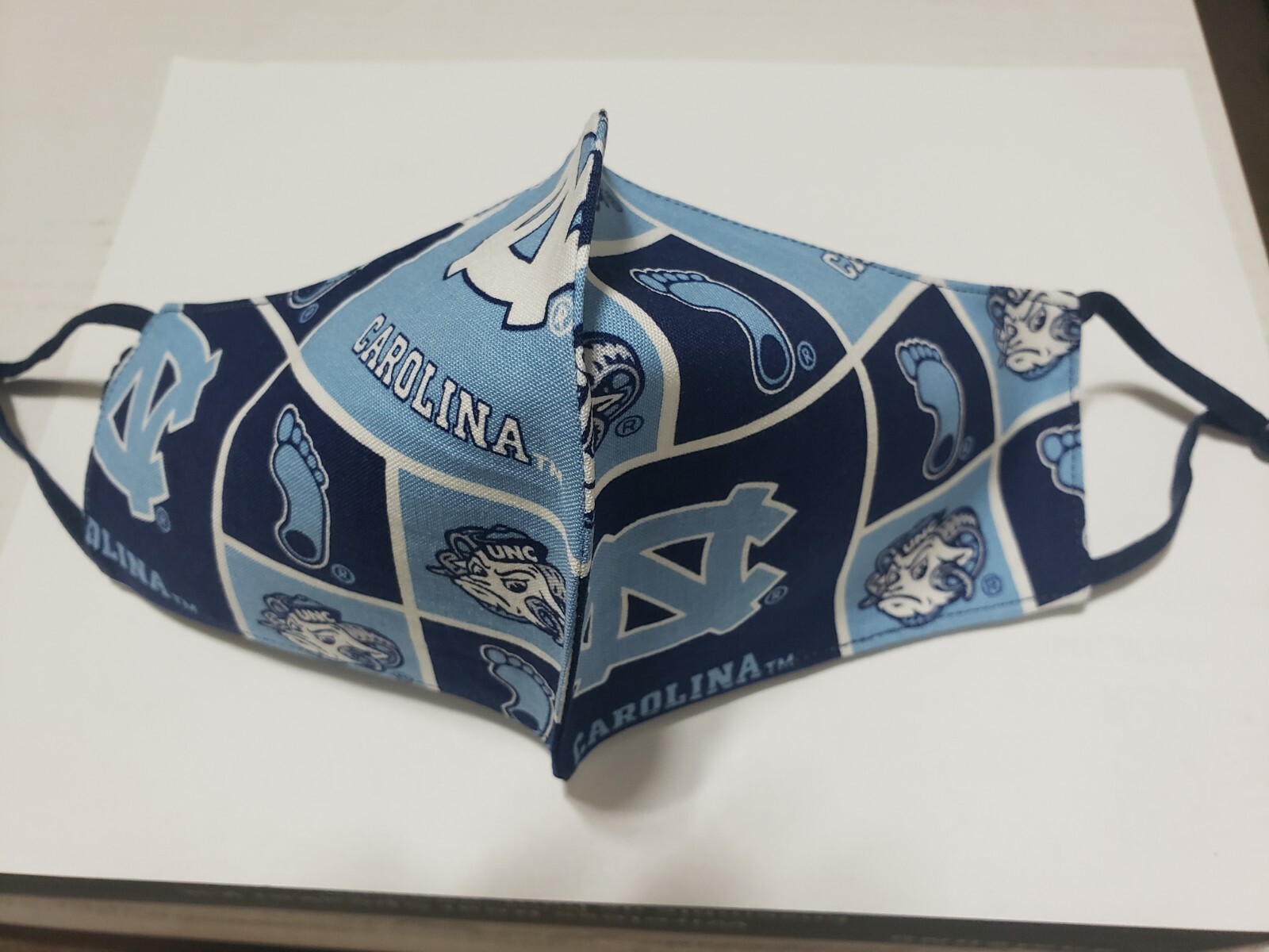 NORTH CAROLINA TAR HEELS face mask. Adult size Adjustable straps Hand ...