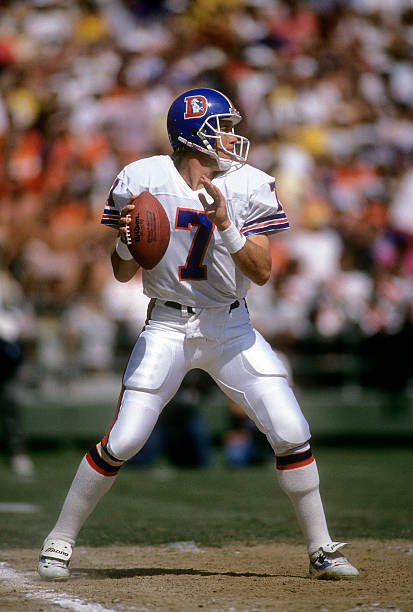 Quarterback John Elway Denver Broncos drops back to pass cir- Football ...