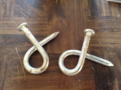 Two twisted nails | eBay