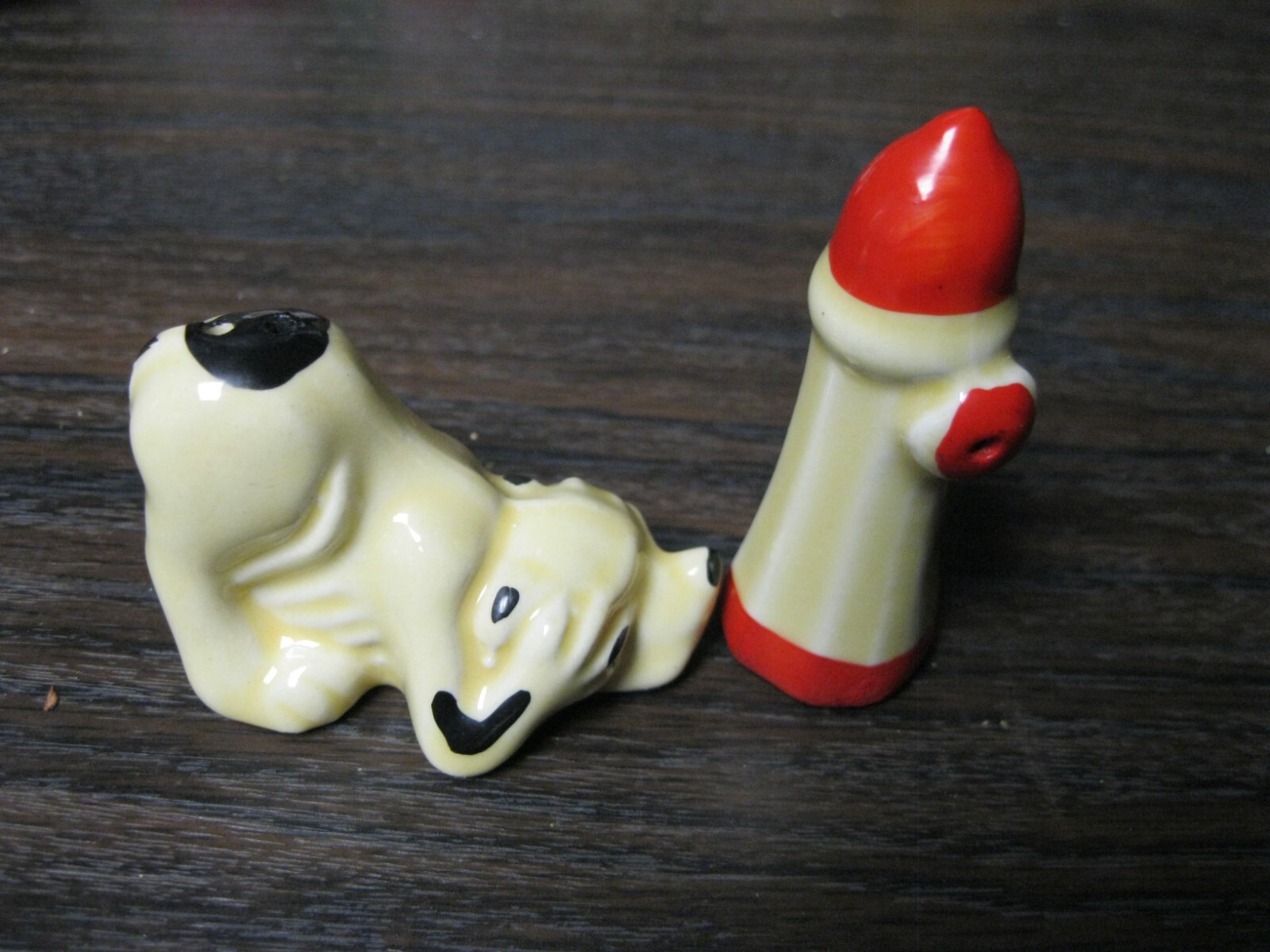Vintage Salt & Pepper Shakers ceramic Dog sniffing / backing up to fire ...