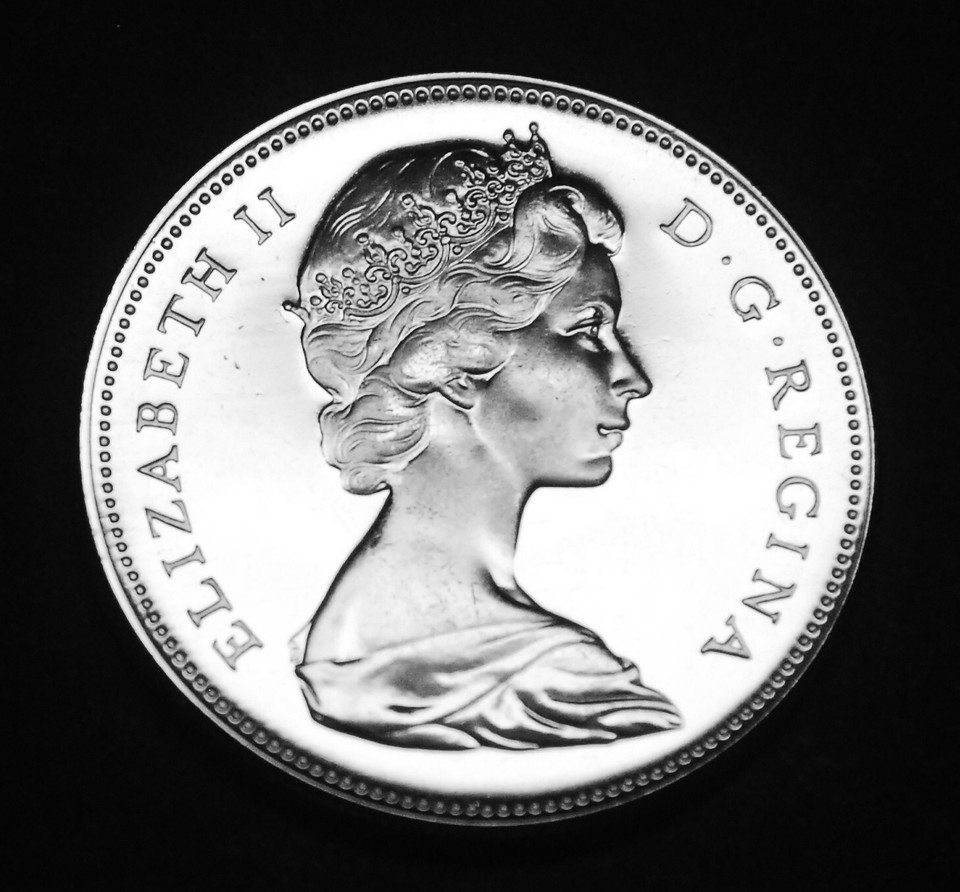 1967 $1 silver proof like coin from stored in mint cellophane and an MS ...