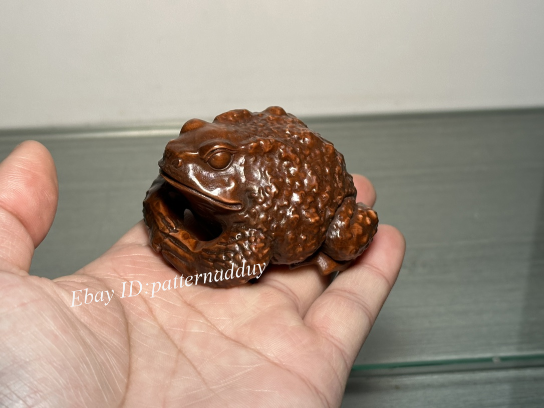 Decorative Pieces of A Four Legged Golden Toad Statue Carved From ...