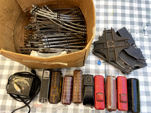 Louis Marx Train Set including metal cars, rails, transformer, and ...