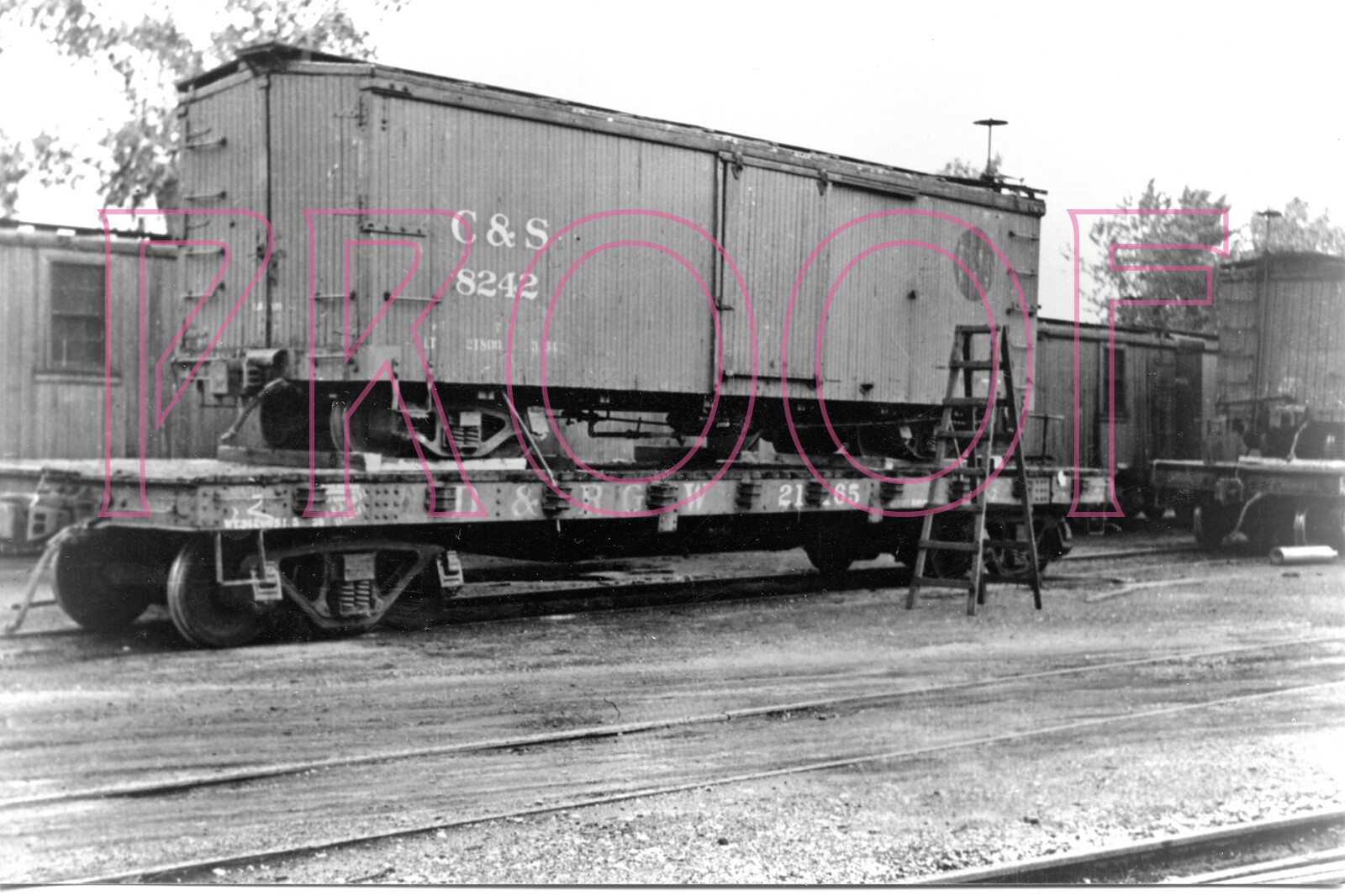 Colorado & Southern (C&S) Auto Boxcar 8242 on DRGW Flatcar 2165 at ...