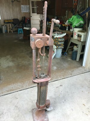 Odd crank unit in old carriage house. Has a hand crank. No gauges ...