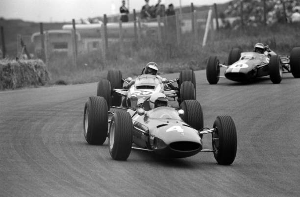 Lorenzo Bandini Ferrari 158 leads Jochen Rindt Cooper T77 Climax a- Old Photo | eBay Australia