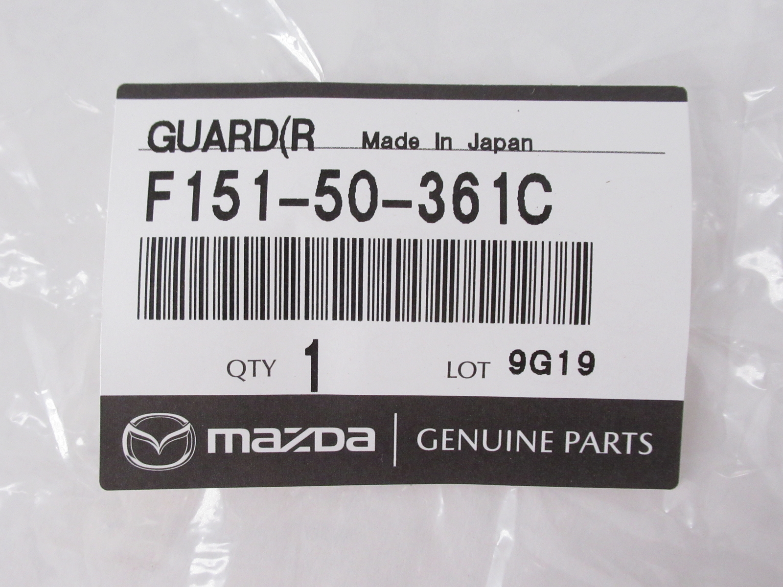 Genuine OEM Mazda F151-50-361C Passenger Rear Exhaust Bumper Trim 2004 ...
