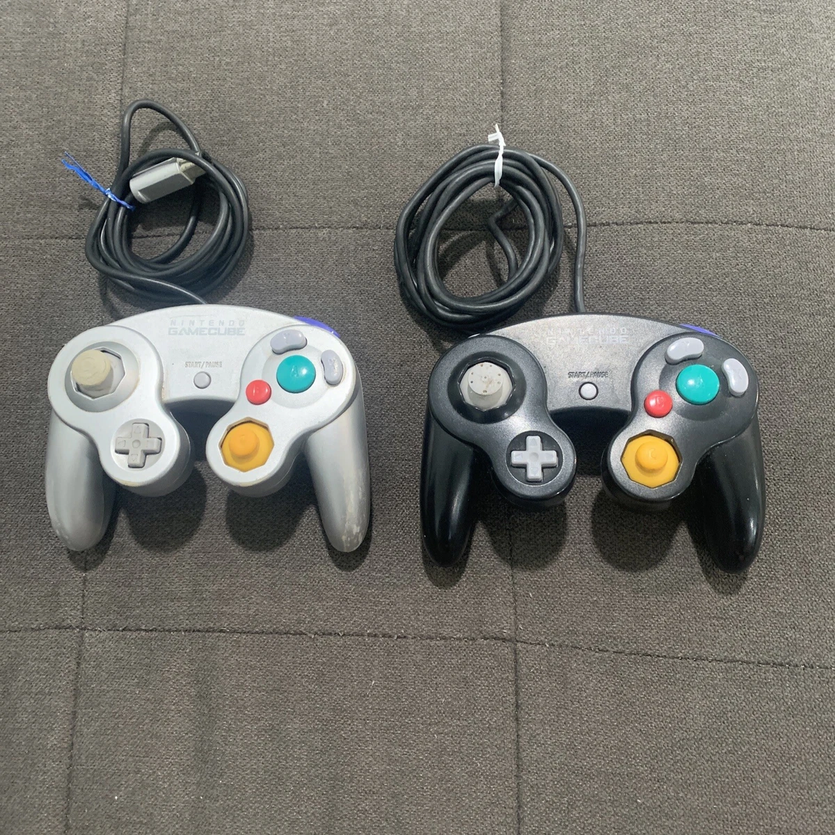 Two Silver Gamecube Black Controller With Black Controllers With One ...