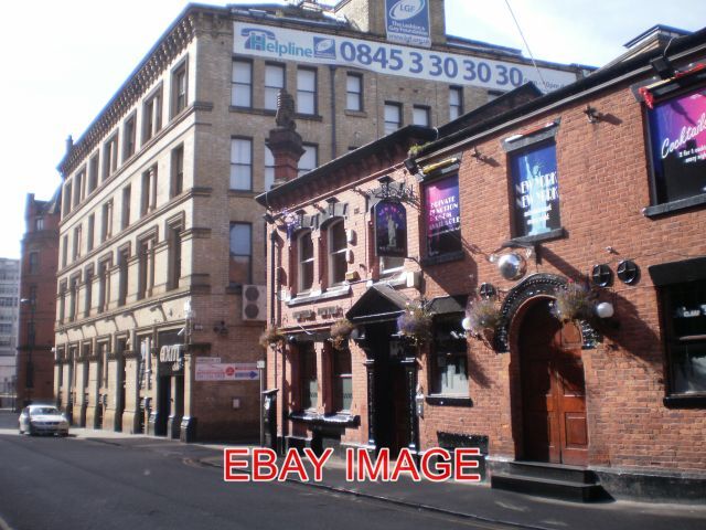 PHOTO BLOOM STREET MANCHESTER ONE OF THE GRIDIRON STREETS THAT FORM THE ...