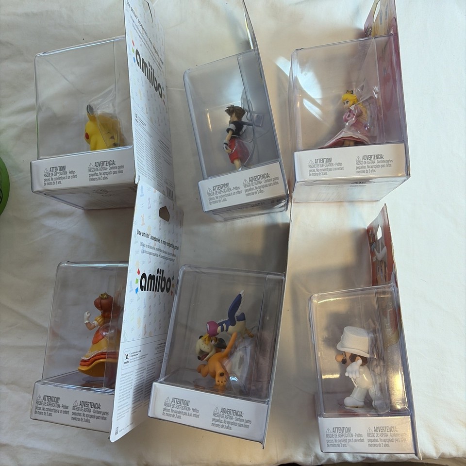 New! Nintendo Super Smash Bros. Amiibo Lot Pikachu Duck Sora Peach ...