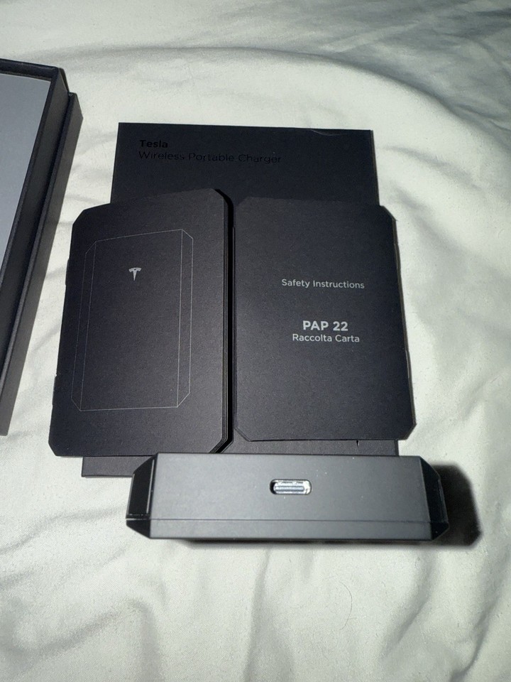 Tesla Black Wireless Portable Phone Charger. Charges On Your Tesla ...