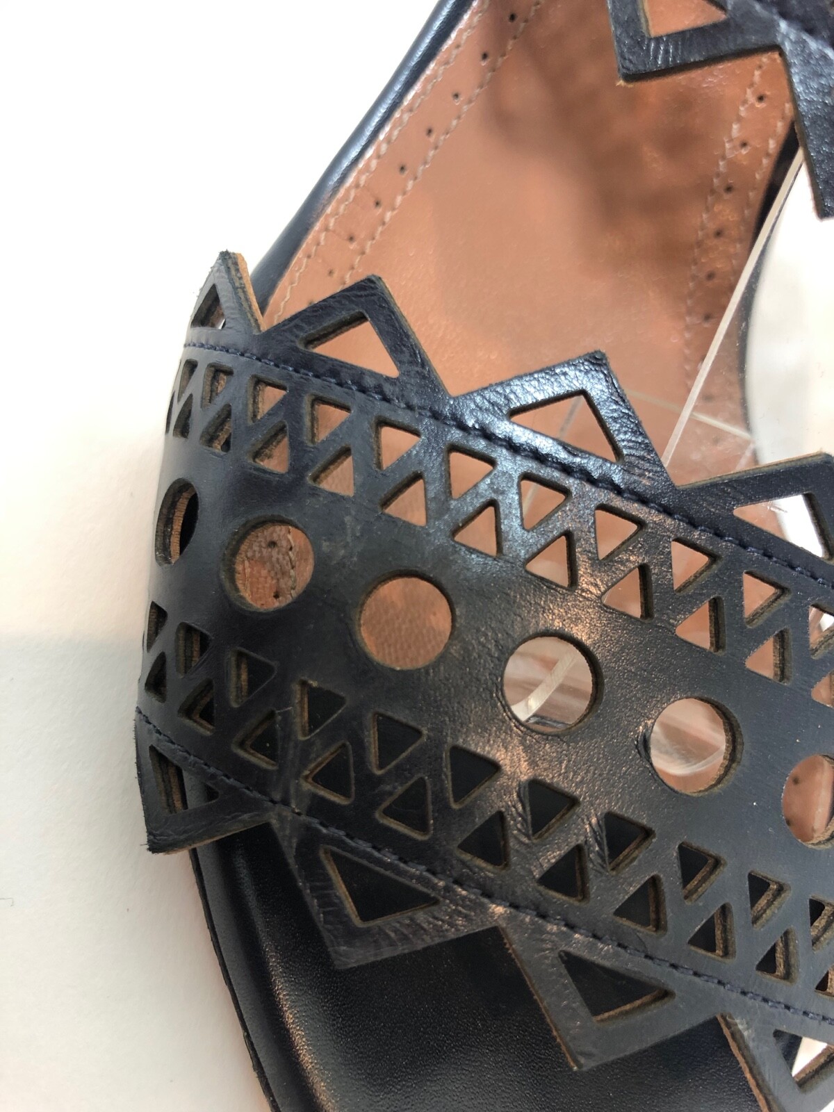 ALAÏA Leather Laser Cut Ankle Strap Sandals in Black … - Gem