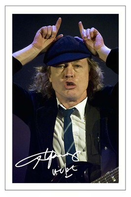 ANGUS YOUNG SIGNED PHOTO PRINT AUTOGRAPH AC/DC | eBay