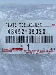 Toyota Genuine OEM PLATE, FRONT SUSPENSION TOE ADJUST, NO.2 48452-35020 ...