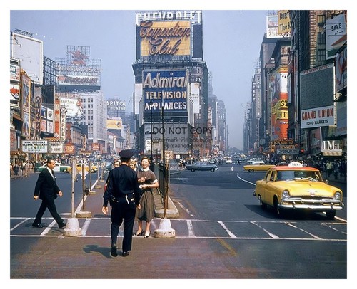 NYPD POLICE OFFICER IN TIMES SQUARE ADVERTISING TAXI CAB STREETSCEENE ...