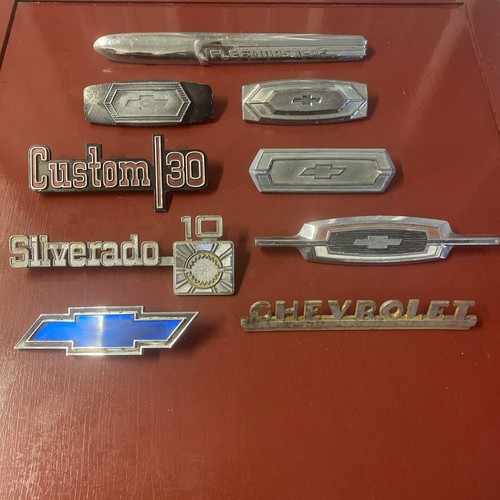 ASSORTED LOT OF VINTAGE CHEVROLET CAR TRUCK METAL EMBLEMS 40 's 50 's ...