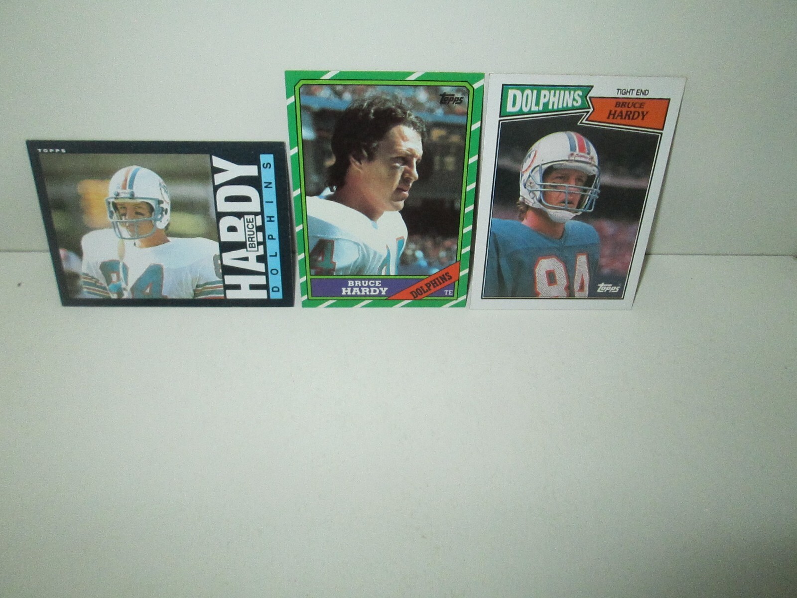 LOT OF 3 BRUCE HARDY 1980s Football Cards #239 312 51 MIAMI DOLPHINS TE ...