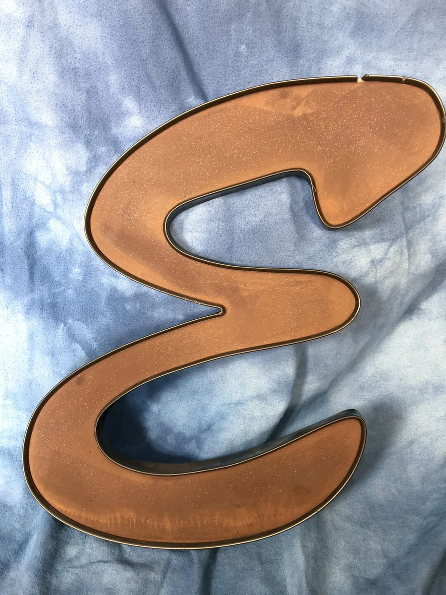 E In Cursive Capital