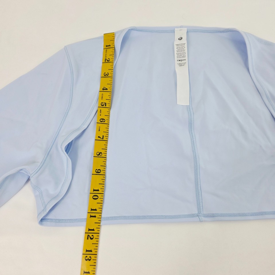 Lululemon Nulu Long Sleeve Yoga Shrug WNDM Windmill Blue Size 14 ...