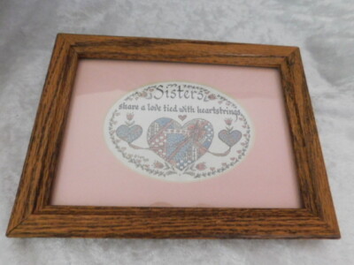 Sisters share a love tied with heartstrings Picture by Lynn Wood Frame ...