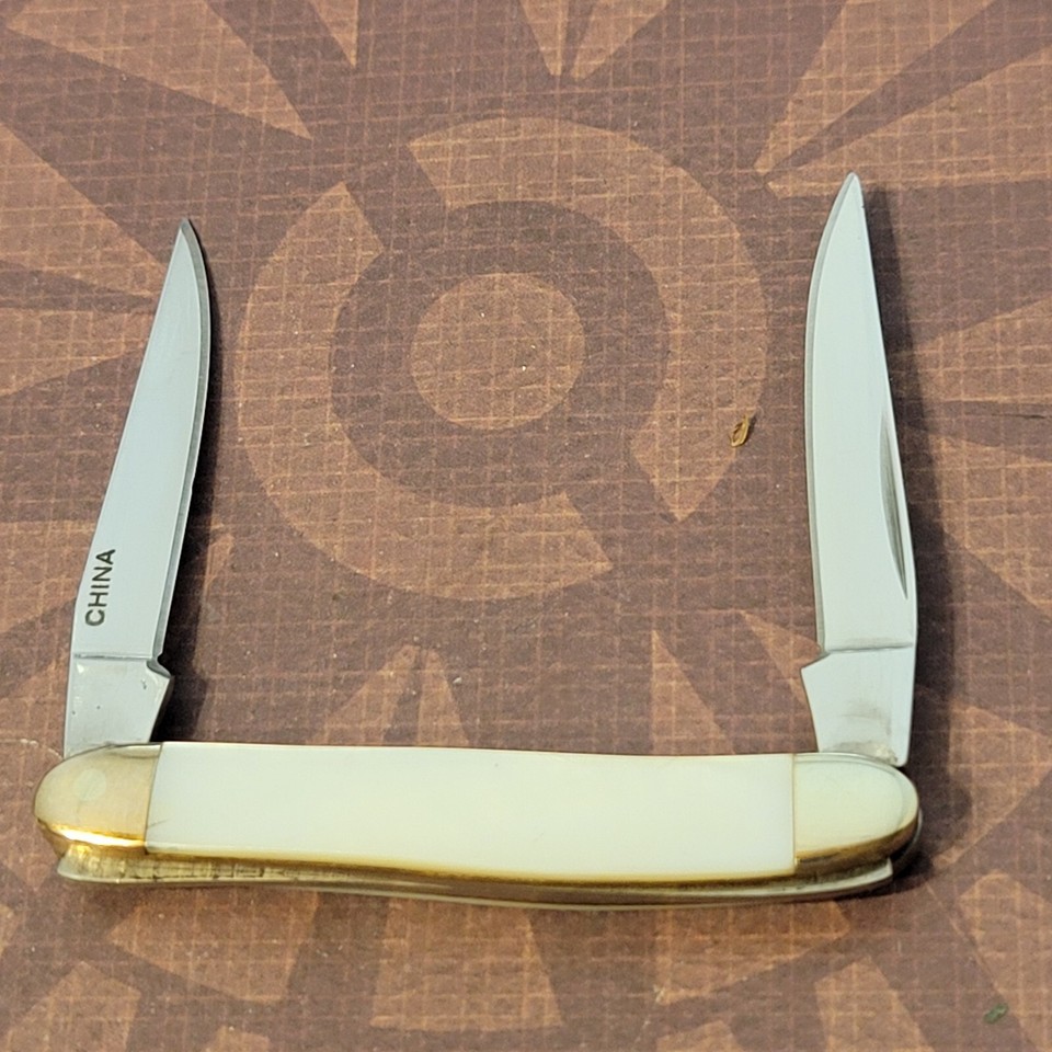 Vintage ROUGH RIDER Knife RR184 Mini Muskrat Smooth Pearl Handles | eBay
