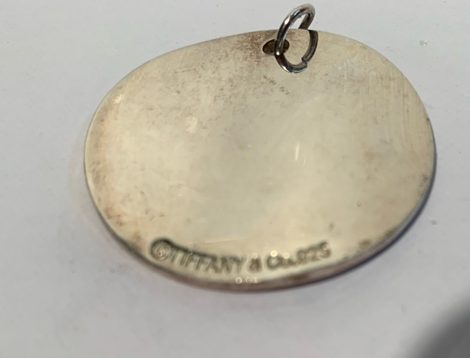 Tiffany & Co Notes 727 Fifth Ave Wave Round Pendant in Sterling Silver ...