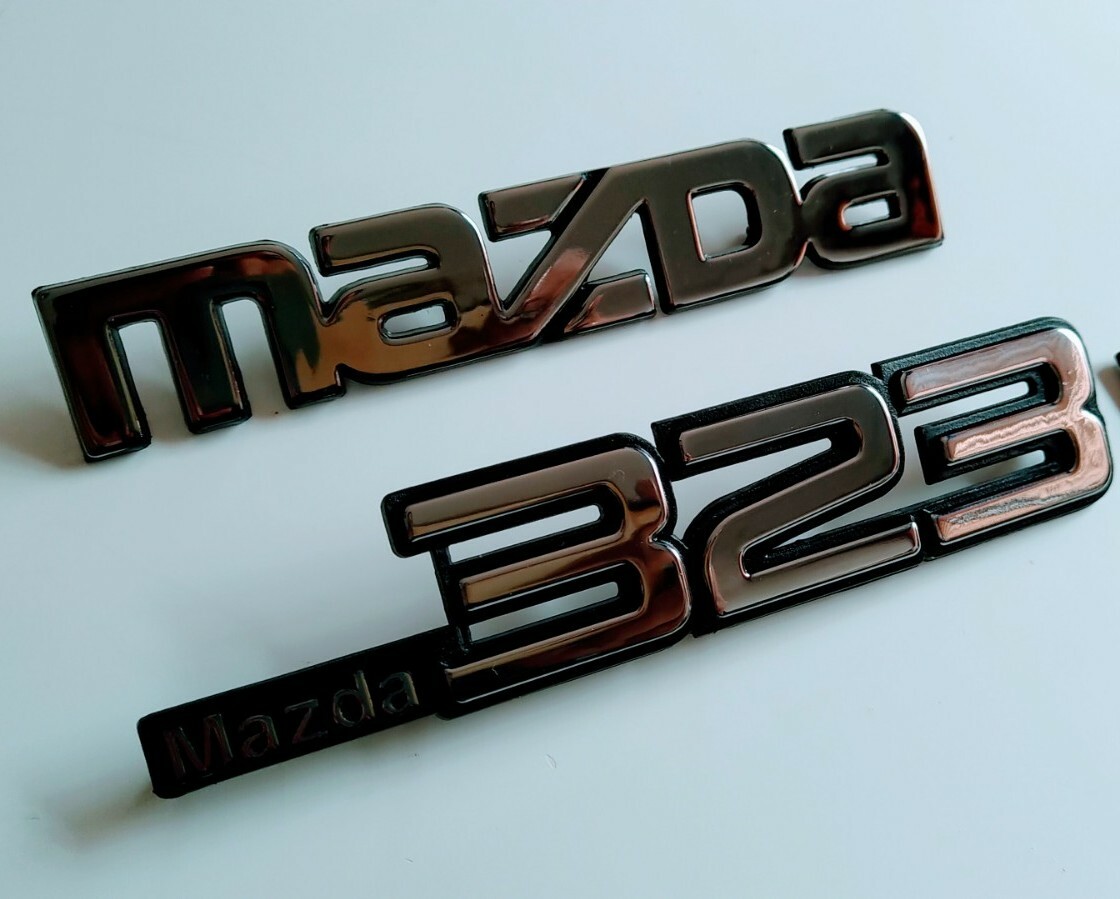 MAZDA 323 EMBLEM ORNAMENT " MAZDA 323 " CHROME | eBay