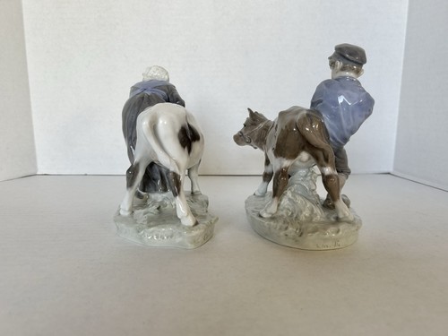 Lot of 2 Royal Copenhagen Figurines Boy with Calf #772 and Girl with ...