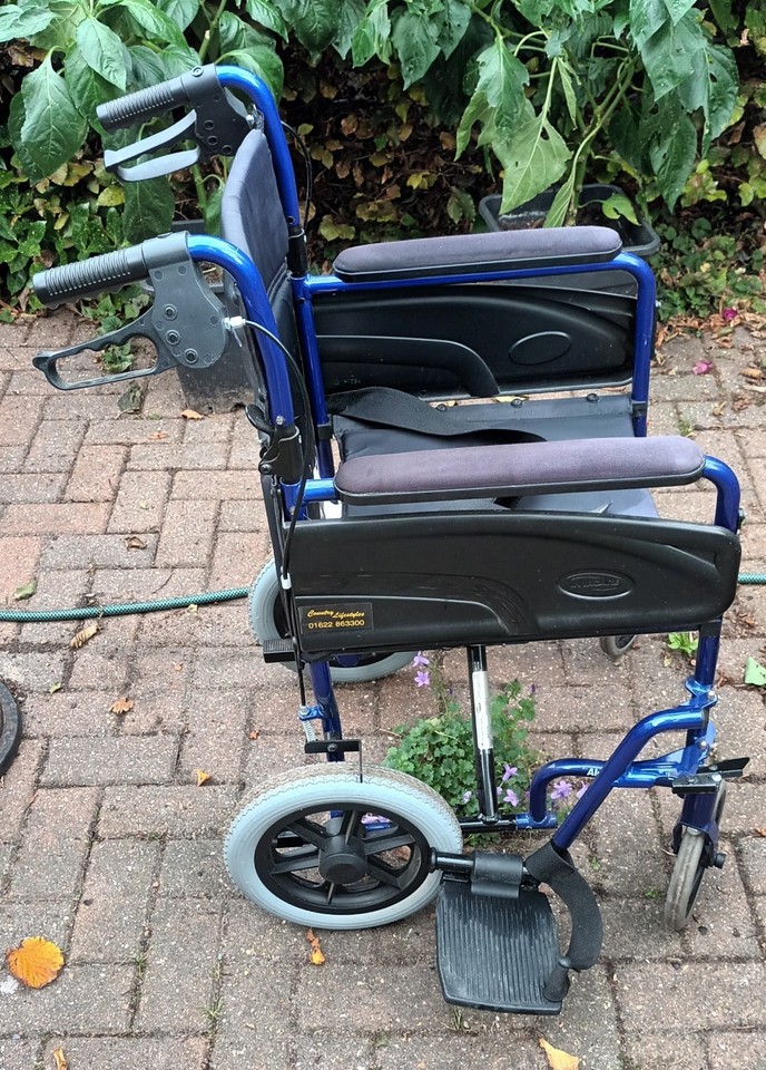 lightweight blue Invacare travel transit folding travel wheelchair with ...