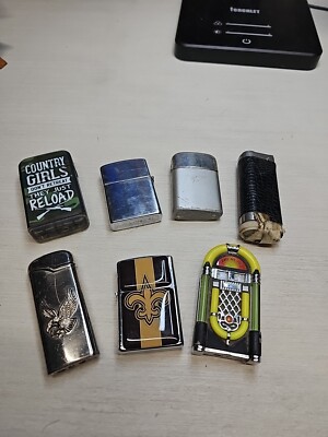 7 Assorted Lighters NEW ORLEANS SAINTS both types of lighters RELIANCE ...