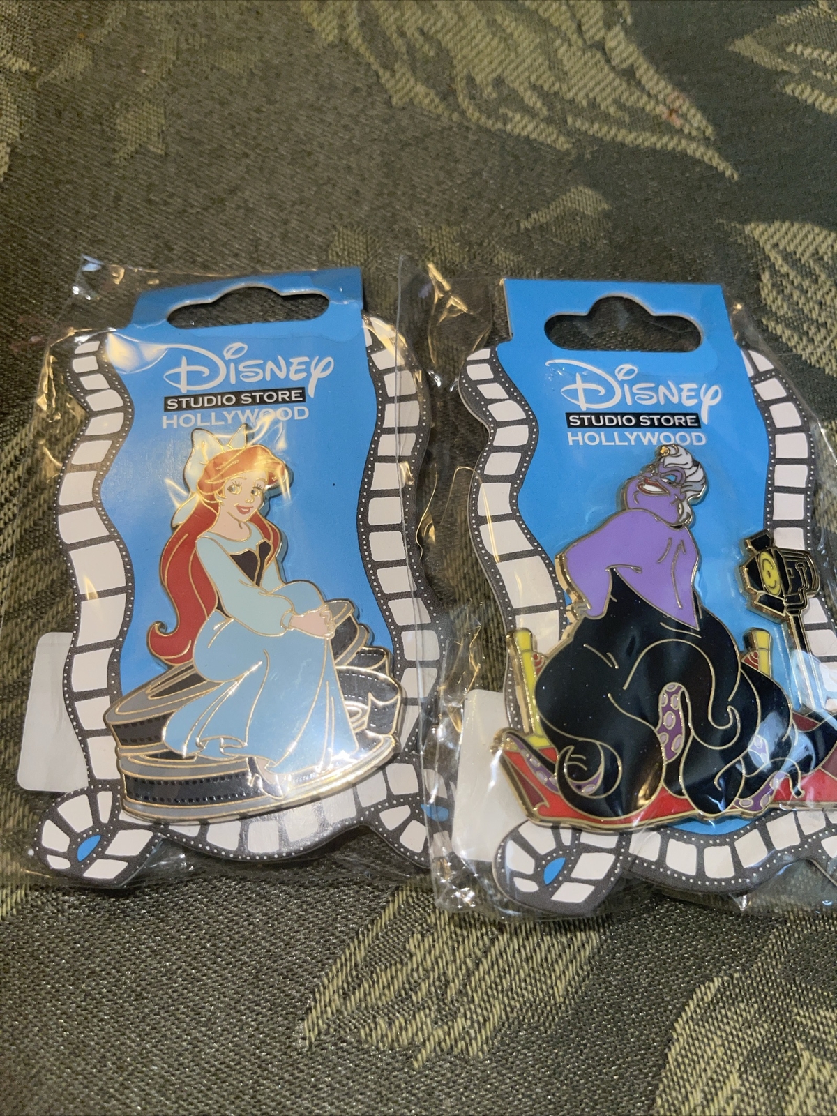 DSSH- Pins Ariel Sitting On rolls Of Film And Ursula Standing On The ...