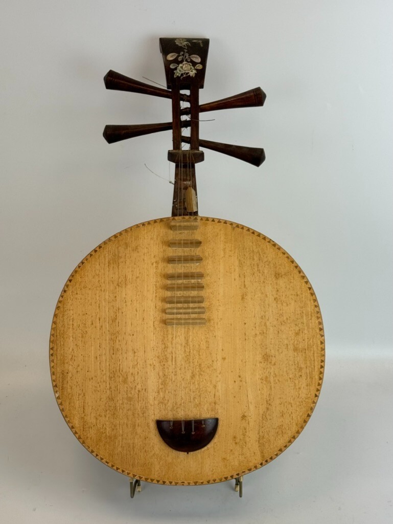 Vietnamese Traditional Musical Instruments Artist Playing T'rung, A