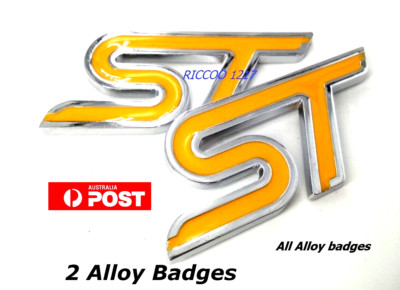 For Ford fiesta ST badges x 2 ALLOY METAL new 7 x 3cm suits ford yellow ...