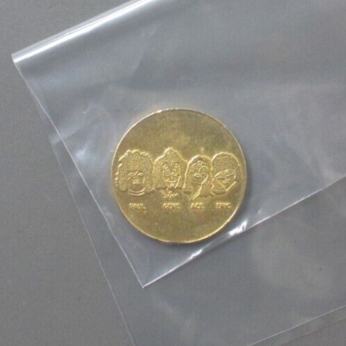 Kiss Coin Copyright 1980 Aucoin Management Inc by agreement with "KISS ...