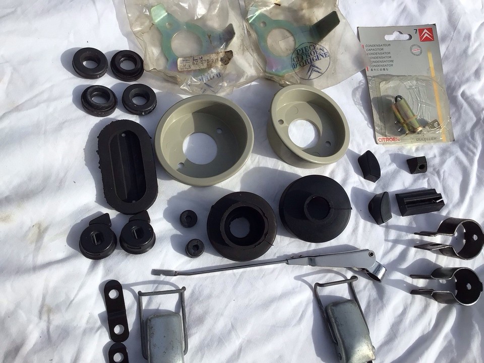 Citroen 2CV box of NOS parts: Hood Clamps,indicator bases,CV boots ...