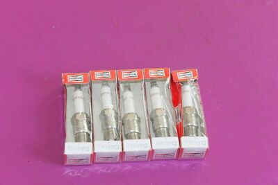 Five (5) Champion RV15YC Spark Plugs. Acquired from a closed dealership ...