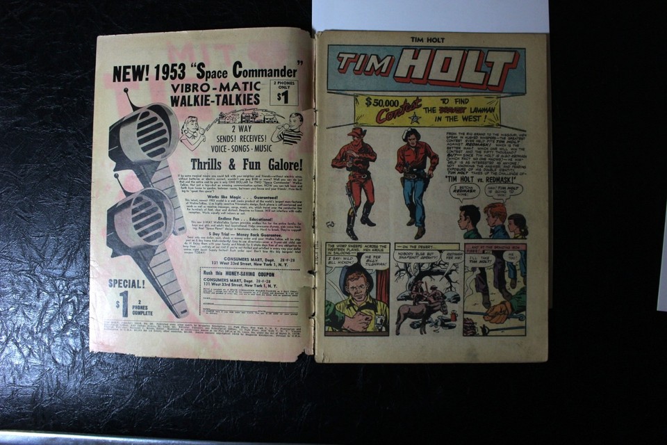 AUCTION .. GOLDEN Age comic - TIM HOLT #36 .. western w/ GHOST RIDER ...