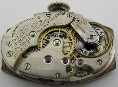early Longines oval Watch Movement 15 jewels 3 adj. for parts ... J.E ...