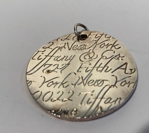 Tiffany & Co Notes 727 Fifth Ave Wave Round Pendant in Sterling Silver ...