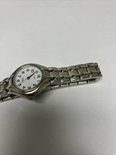 NEEDS BATTERY Indiglo watch. Multi colored face. water resistant ...