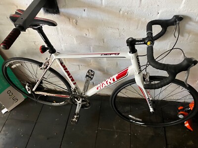 Giant defy, white/red. M/L. Good condition but rear derailleur broke ...