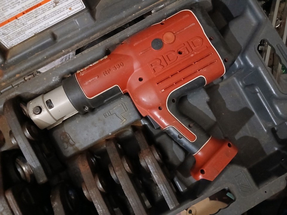 Ridgid RP 330 PRO Press Tool with Jaw Set 1/2"- 2" With Battery Charger ...