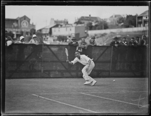 Japanese tennis player Takeichi Harada crouching to return the bal- Old ...