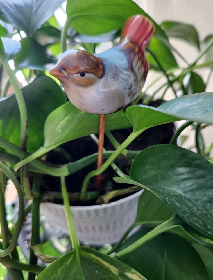 Porcelain Glazed Ceramic Sparrow Bird Figurine On A Pick Display In ...