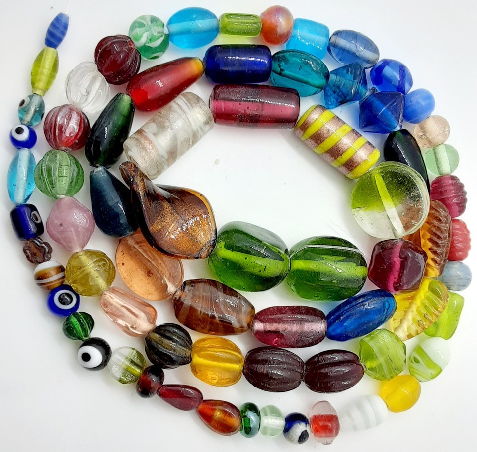70 ASSORTED MOSTLY PRESSED GLASS BEADS VARIETY OF SHAPES COLORS SIZES ...