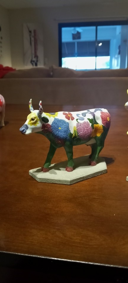 FOR SALE!!! All of them for the price, cow parade collectible figurines ...