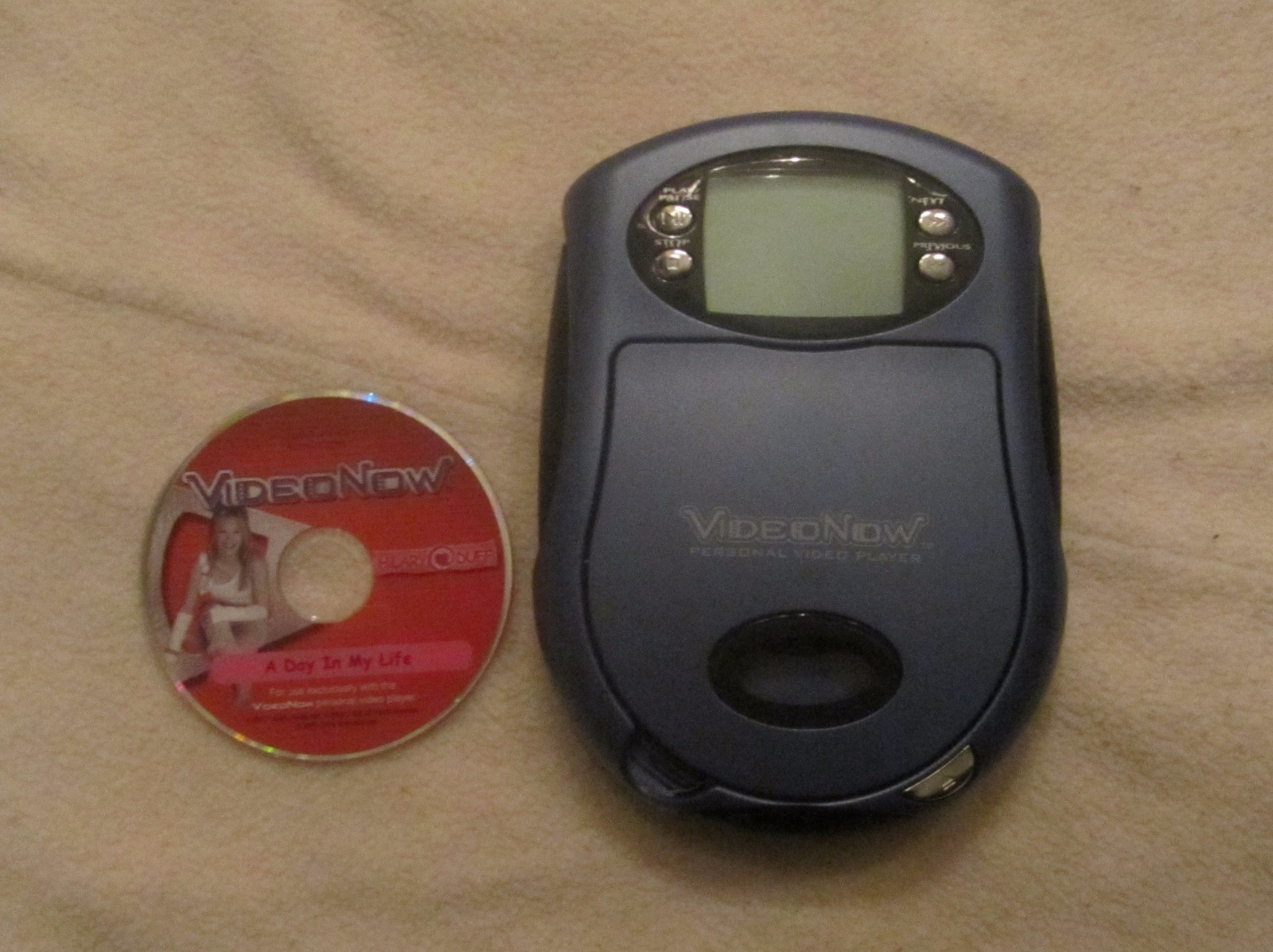 A Blue VideoNow Personal Video Player and a disc | eBay